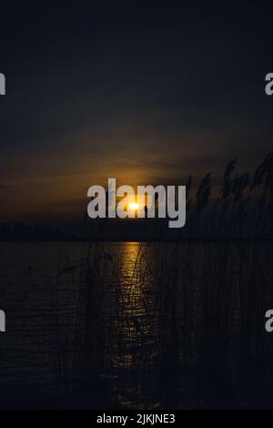 A scenic sunset at Lake Tegel connected to the River Havel in Berlin ...