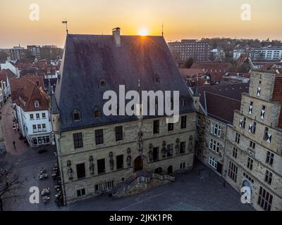 An aerial shot of a typical European square surrounded by aged ...