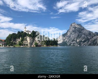 View to Traunkirchen with its church on a rock, Upper Austria ...