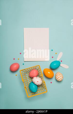 easter eggs on light blue plate over stone background Stock Photo - Alamy