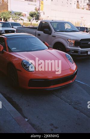 Red Porsche automobile parked on street, London, England, UK Stock ...