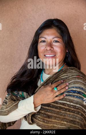 Isleta Pueblo Woman dressed in shawl and turquoise beads. Santa Fe New ...