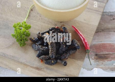 Fried Mopane Worms and pap, a very popular delicacy in Africa and ...