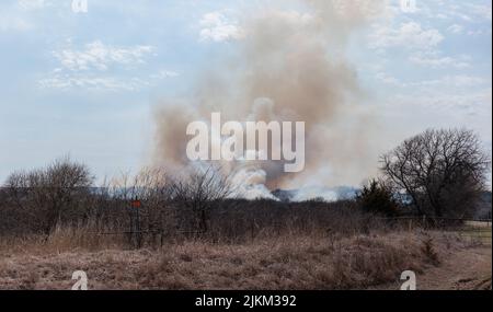 Smoke from controlled prairie fires fill the sky near Belvue, Kan ...