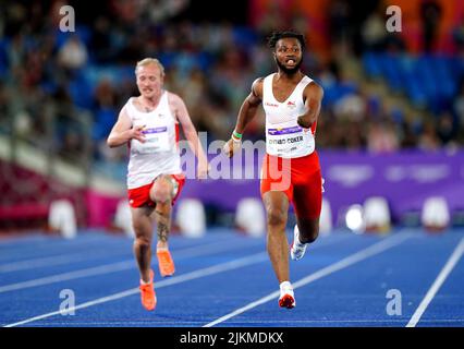 England's Emmanuel Temitayo Oyinbo-Coker celebrates winning the Men's ...
