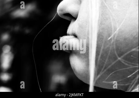 Little girl sticking out her lower lip in a defiant pout Stock Photo ...