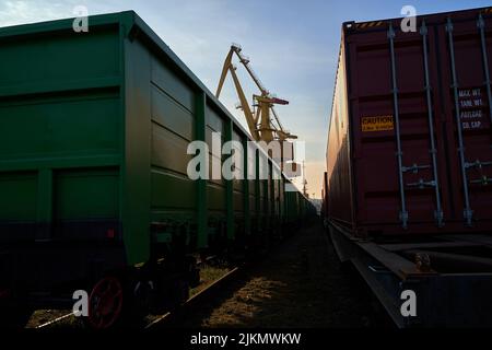 Railway wagon in an industrial port. railway carriage for ore ...