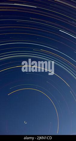 A vertical shot of a night sky milky way Stock Photo - Alamy