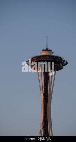 A vertical shot of the Space Needle observation tower against the blue ...
