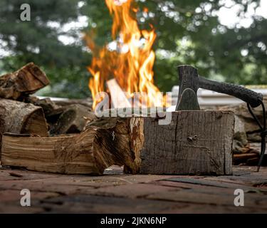 A closeup shot of an ax with a timber background in the North of ...