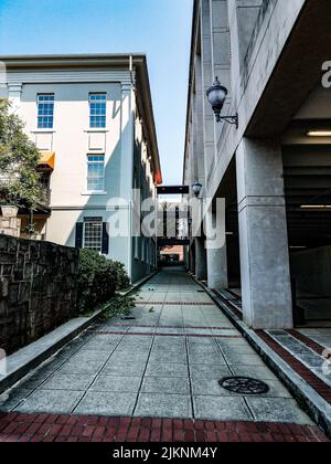 Path between two buildings Stock Photo - Alamy