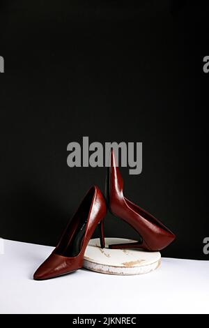 Vertical shot of fashionable lady shoes on the blurry background Stock ...