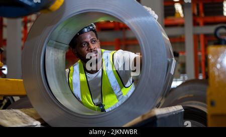 African American Heavy industry Foreman factorial worker check stock of ...