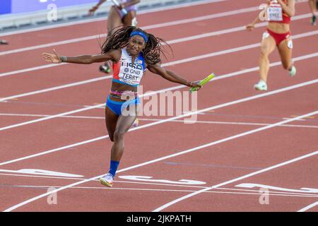 Twanisha Terry (USA) crosses the finish line of the 4 x 100 meter relay ...