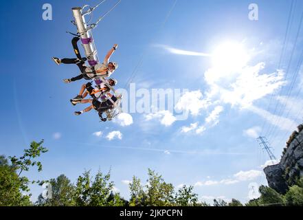 EDITORIAL USE ONLY Riders on Europe's largest swing ride, as it opens ...