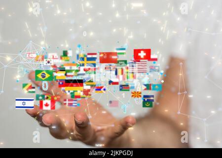 The flags of the world countries over a person's hand. Globalization ...