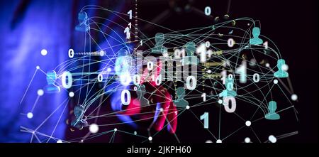 A 3D rendering of human icons with binary codes -social network communication concept Stock ...