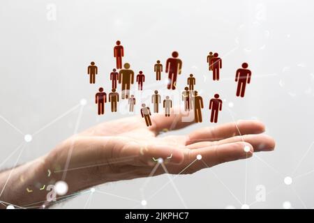 A 3D rendering of human icons over a hand-social network communication ...