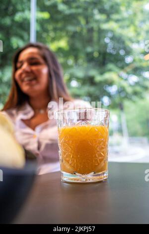 female lady having prosecco in a bar outdoors Stock Photo - Alamy