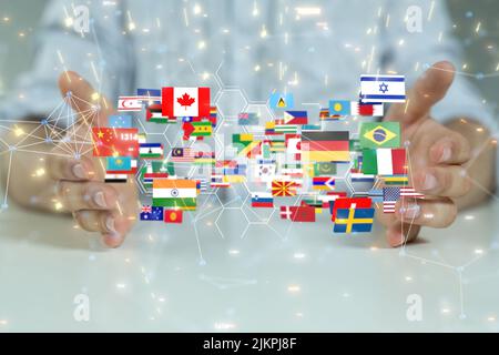 A 3D rendering of the world's national flags on a blurry background ...