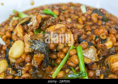 A delicious Chinese dish, braised bullfrog with soybeans Stock Photo ...