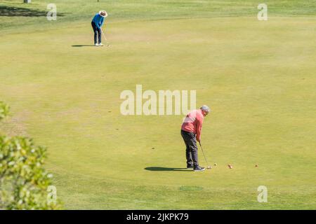 An old man playing golf at the Jamor Golf Course in sunny weather Stock ...