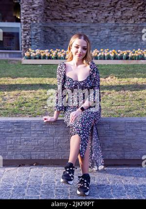 Beautiful young caucasian woman wearing casual clothes making fish face ...