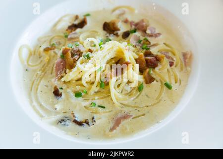 Die cut of Carbonara Spaghetti on black isolated Stock Photo - Alamy