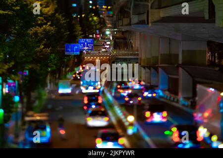 A night miniature traffic jam under the highway in Tokyo Stock Photo ...