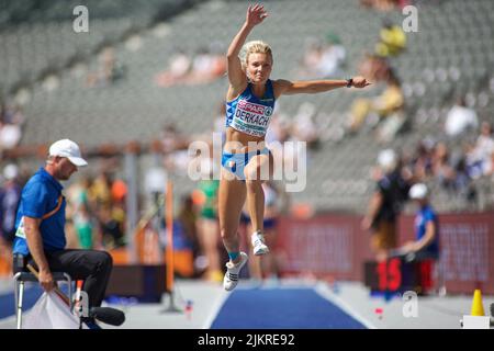 Dariya Derkach participating in the triple jump at the European ...