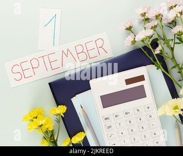 Tablet computer with flowers and stationery on pink background Stock ...