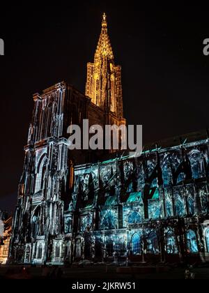 Laser lighting show on the walls of Cathedral Stock Photo - Alamy