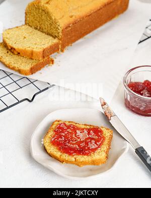 Bread with tasty strawberry jam on white background Stock Photo - Alamy
