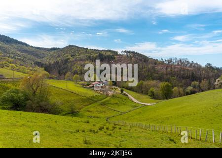 Traditional Basque farmhouse on top of Mount Andatza in the forest in ...