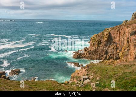 high ocean waves hitting on rocky coast Stock Photo - Alamy