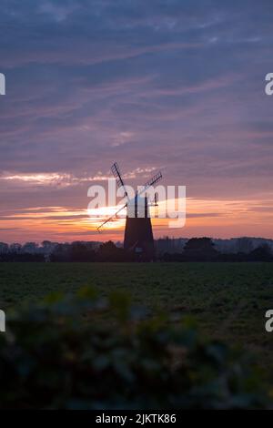 Beautiful shot of windmill at sunset Stock Photo - Alamy
