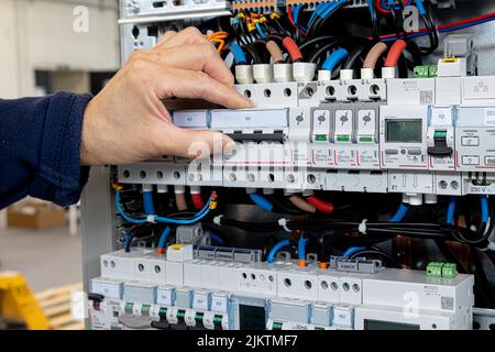 Hand Switching Electrical Circuit Breaker Stock Photo - Alamy