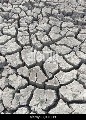 Texture of gray dry cracked earth. The concept of drought, global ...
