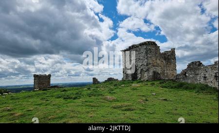 A Beautiful shot of a Rothley Castle with a green grass field and a ...