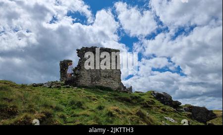 A beautiful shot of a Rothley Castle with a green grass field and a ...