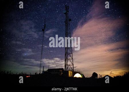 Telecommunication tower with beautiful sky Stock Photo - Alamy