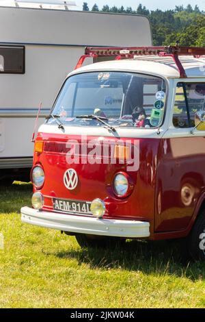 red and white 1970s vintage VW Volkswagen Type 2 transporter Kombi or ...