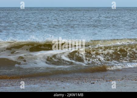A spindrift wave close to the beach of the North Sea Stock Photo - Alamy