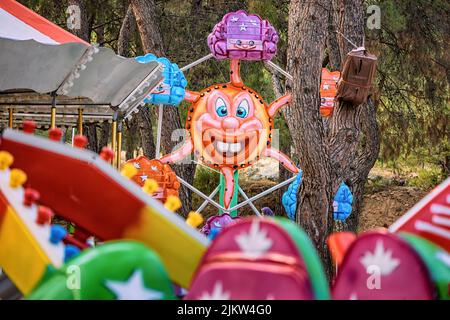 A strange and frightening attraction in an outdoor circus and amusement ...