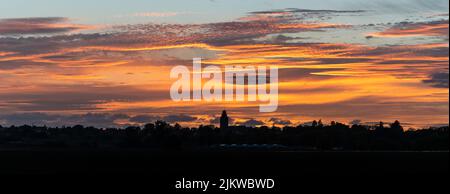 Sunset behind the village of Sutton-in-the-Isle, Cambridgeshire Stock ...