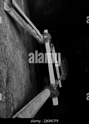 Rope ladder hanging on wooden background with old watches Stock Photo ...