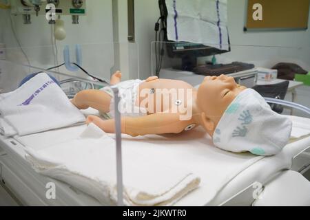 New born mannequin during a pediatric resuscitation simulation workshop ...
