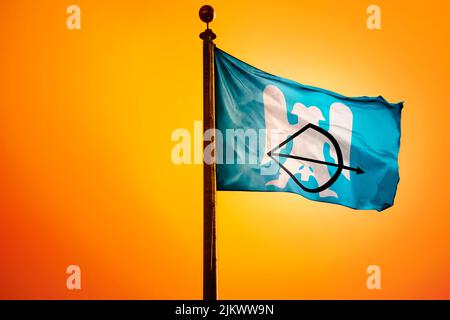 A digital illustration of a flag of the Seljuk Empire waving against a ...