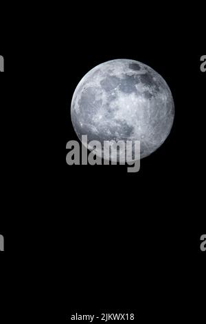 A beautiful shot of the full moon isolated in the dark blue sky Stock ...