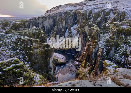 Wiggly winding canyon, Southern Iceland. River winds through steep ...